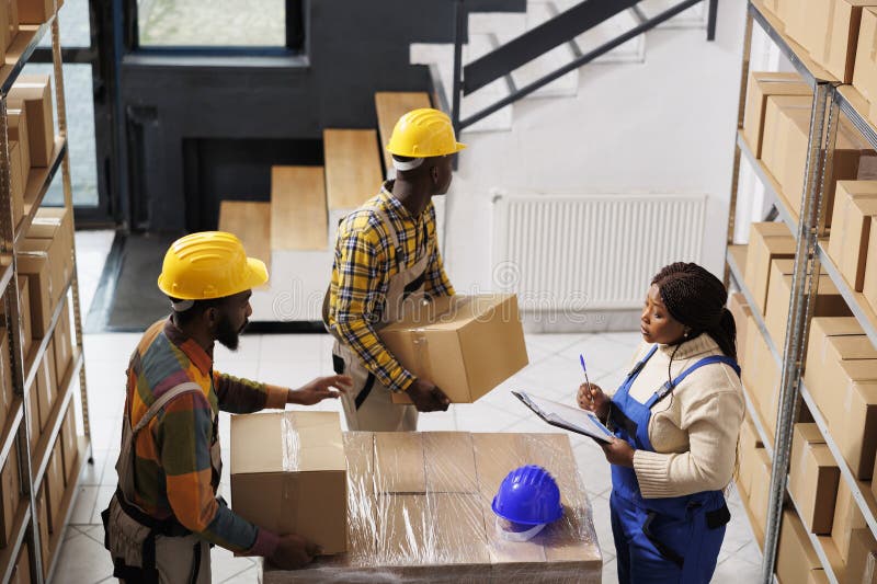 Warehouse Loaders Lifting Parcels Ready for Shipment Stock Photo ...