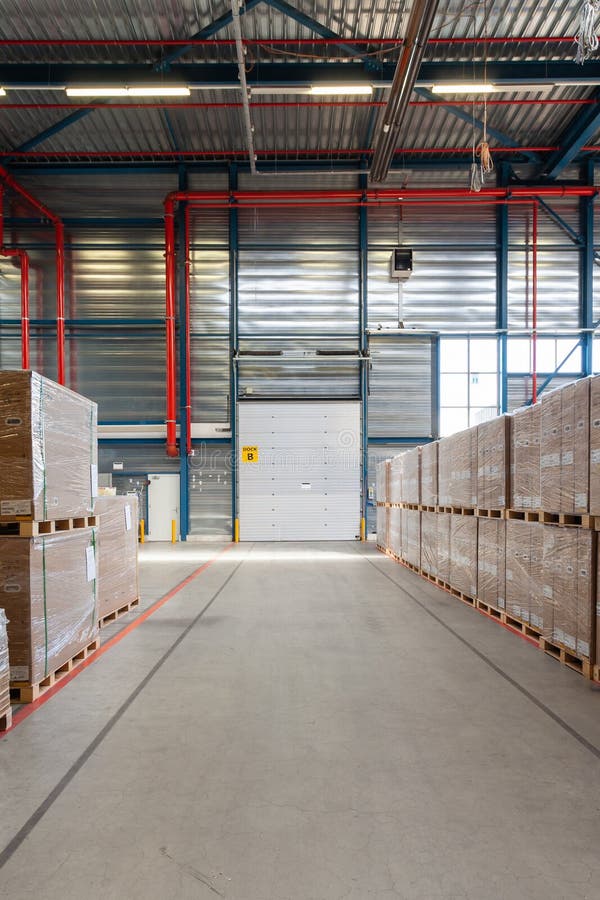 Warehouse with a Loading Door and Pallets with Boxes Stock Photo ...