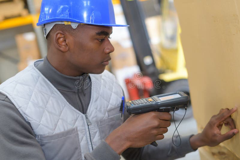 Warehouse Management System Worker with Barcode Scanner Stock Image ...
