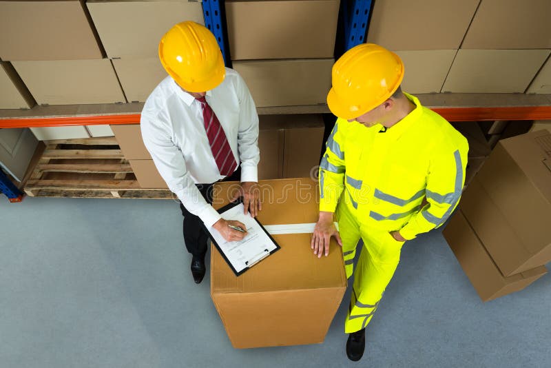 Checking Inventory in Minimart on Touchscreen Tablet Stock Photo ...