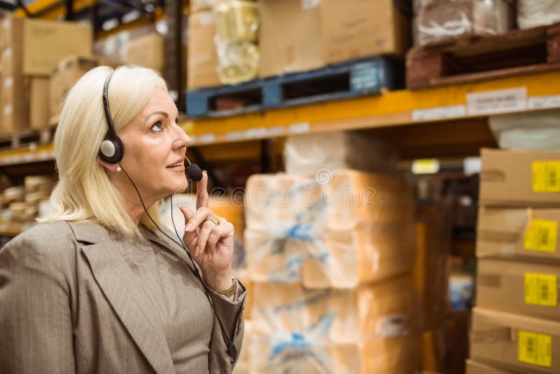 Warehouse Manager Giving Orders Headset Stock Photos - Free & Royalty ...
