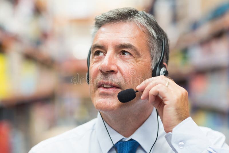 Warehouse Manager Giving Orders Headset Stock Photos - Free & Royalty ...