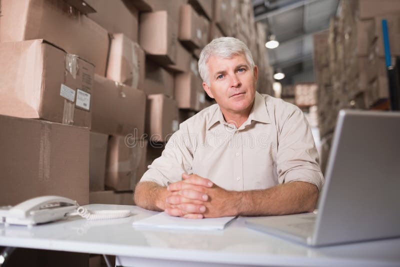 Warehouse Manager with Laptop at Desk Stock Photo - Image of boss ...