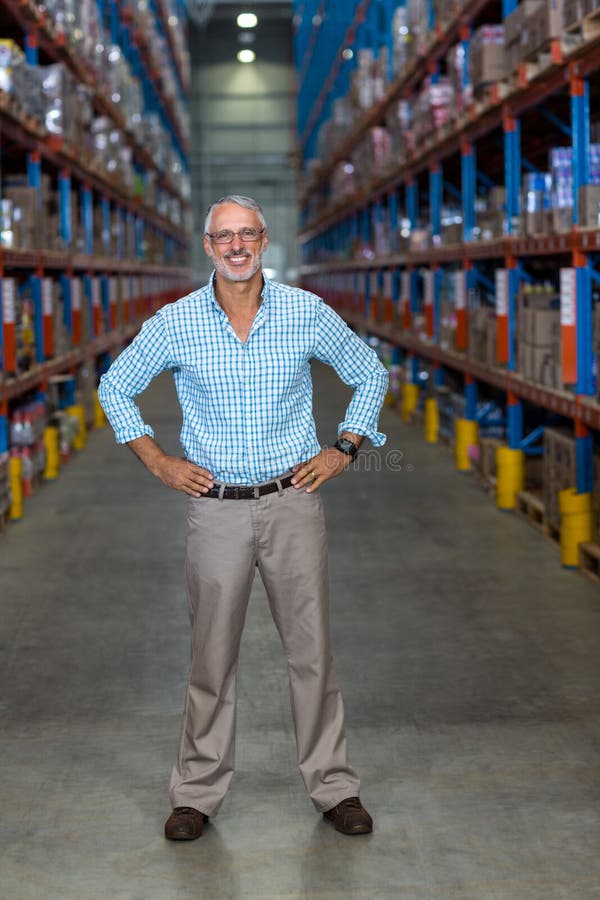 Warehouse Manager Standing with Hands on Hip Stock Photo - Image of ...