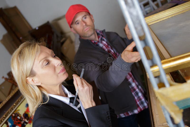 Warehouse Manager and Subordinate in Warehouse Stock Photo - Image of ...