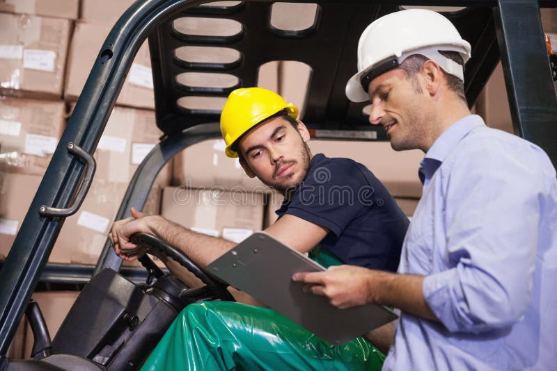 Warehouse Manager Talking with Forklift Driver Stock Image - Image of ...