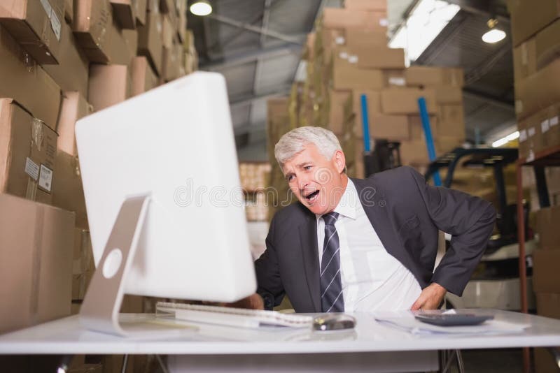 Warehouse Manager Using Computer Stock Photo - Image of male, cardboard ...