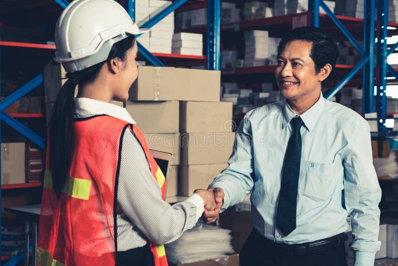 Warehouse Manager and Worker Working in the Storehouse Stock Image ...