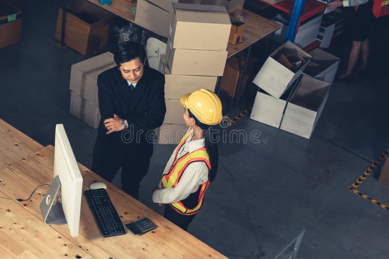 Warehouse Manager and Worker Working in the Storehouse Stock Photo ...