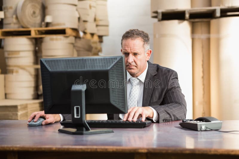 Warehouse Manager Working on Computer Stock Image - Image of mouse ...
