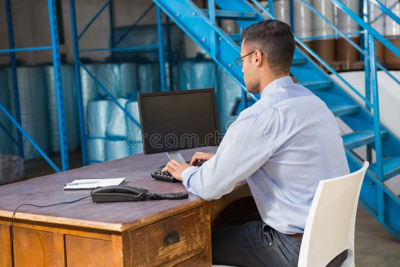 Warehouse Manager Working on Computer Stock Photo - Image of monitor ...