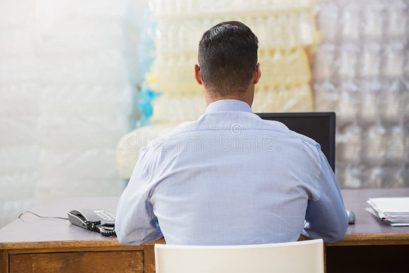Warehouse Manager Working on Computer Stock Image - Image of mixedrace ...