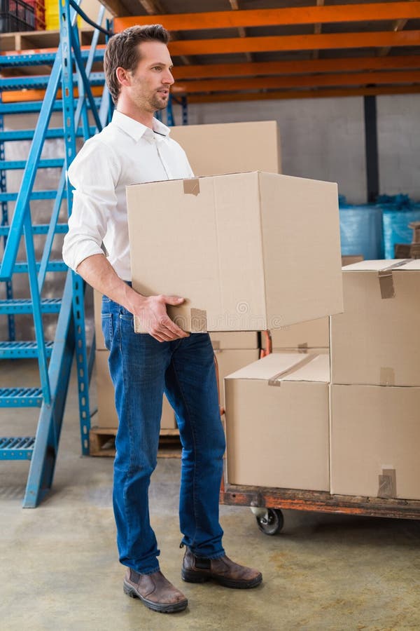 Warehouse Managers Loading a Trolley Stock Image - Image of package ...