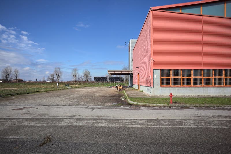 Warehouse Next To a Highway Stock Photo - Image of center, high: 370295748