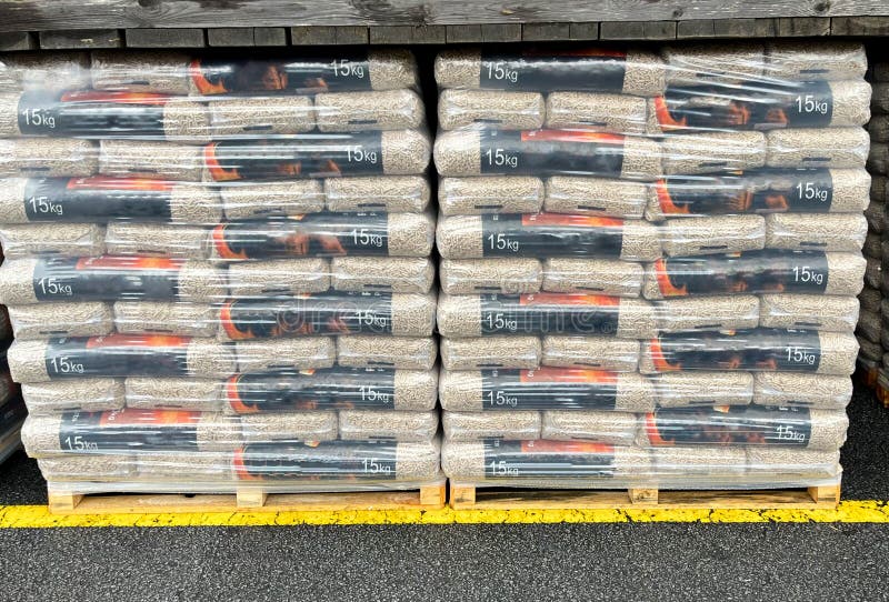 Warehouse with Packed Wooden Pellets on Pallets Ready for Shipment ...
