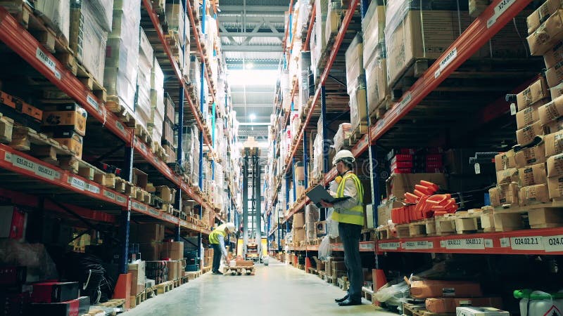 Warehouse Premises with Racks and Boxes on Them Stock Footage - Video ...