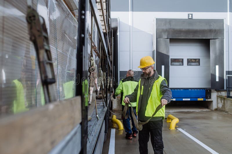 Warehouse Receivers Unloading of the Truck in Front of Warehouse ...