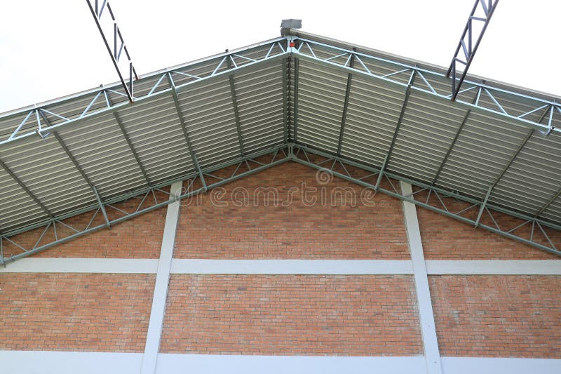 Warehouse Roofing Built on Brick Wall Facade Stock Image - Image of ...