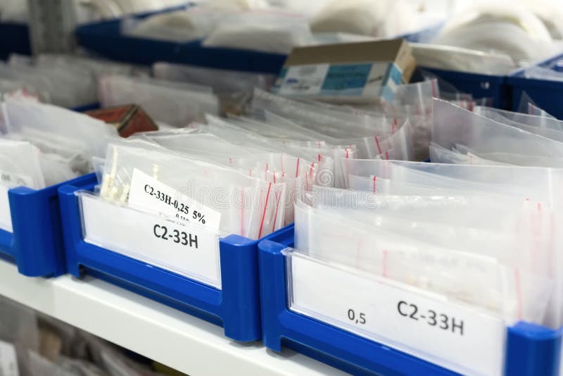 A Blue Plastic Container in Which There are Many Zip Packages. Stock ...