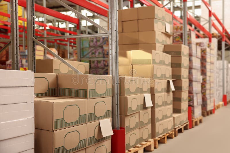 Warehouse with Stacks of Boxes on Wooden Pallets. Wholesaling Stock ...