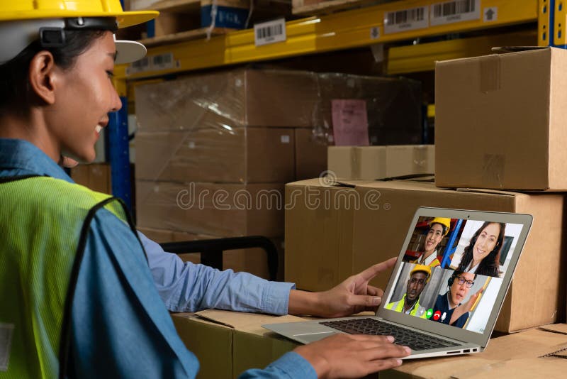 Warehouse Staff Talking on Video Call at Computer Screen in Storage ...