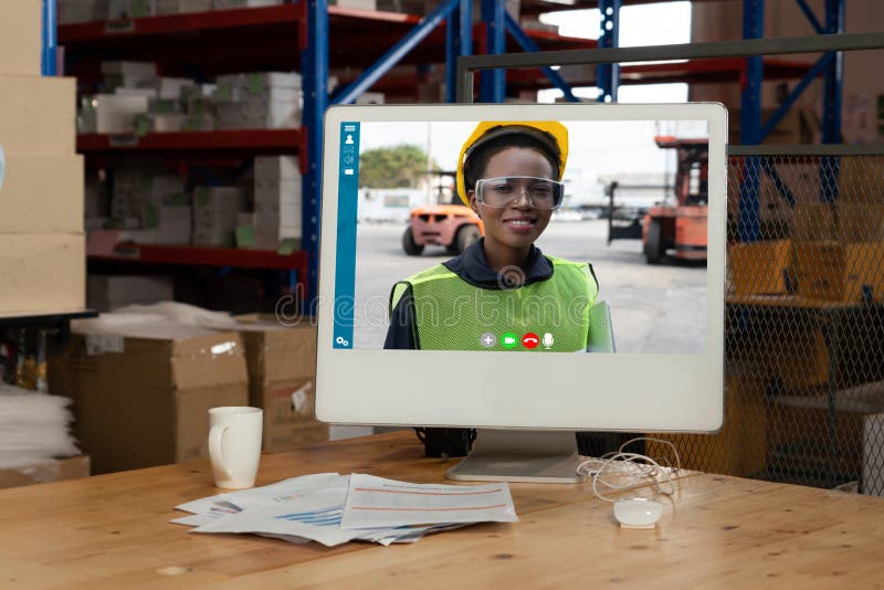 Warehouse Staff Talking on Video Call at Computer Screen in Storage ...