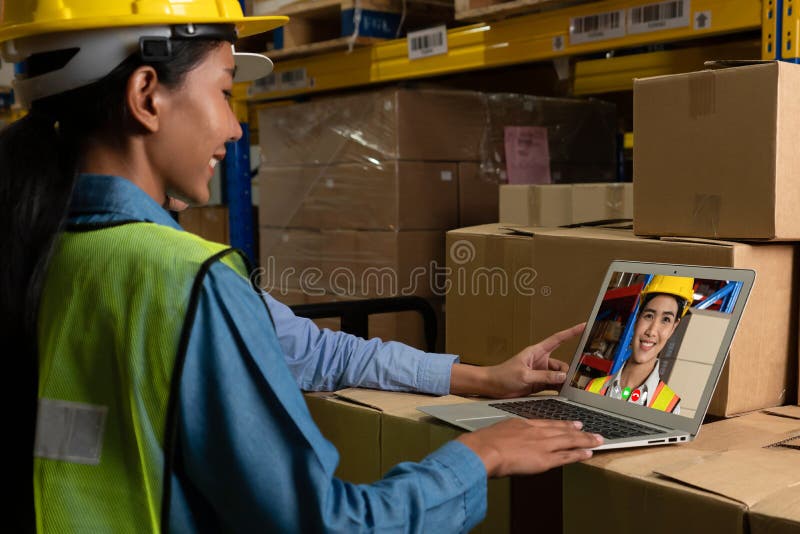 Warehouse Staff Talking on Video Call at Computer Screen in Storage ...