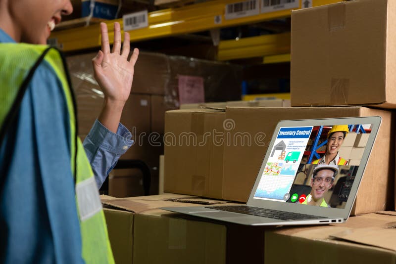 Warehouse Staff Talking on Video Call at Computer Screen in Storage ...