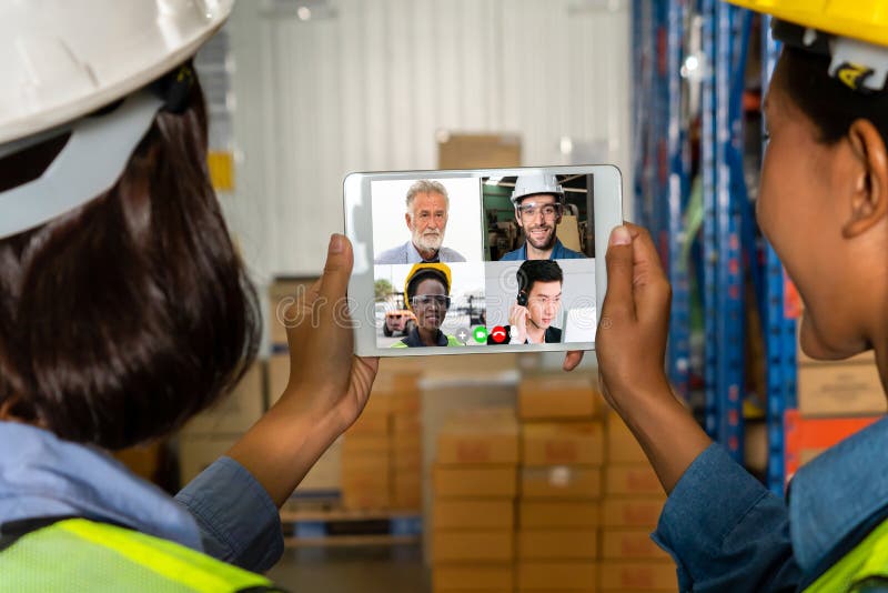 Warehouse Staff Talking on Video Call at Computer Screen in Storage ...