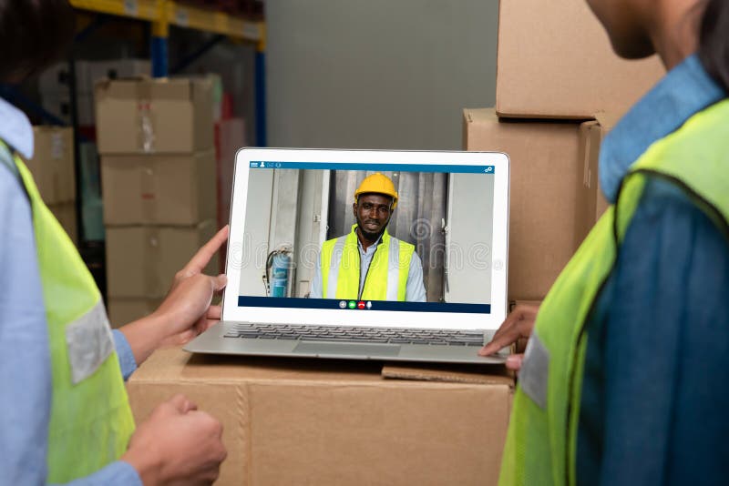 Warehouse Staff Talking on Video Call at Computer Screen in Storage ...