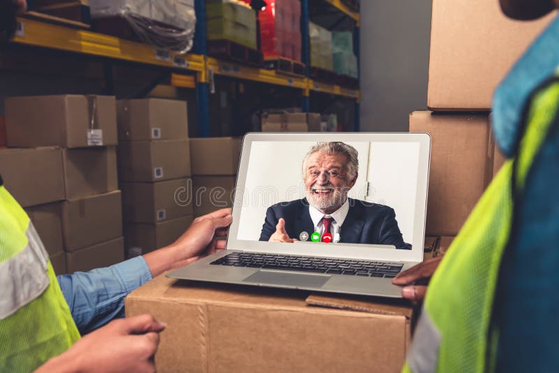 Warehouse Staff Talking on Video Call at Computer Screen in Storage ...