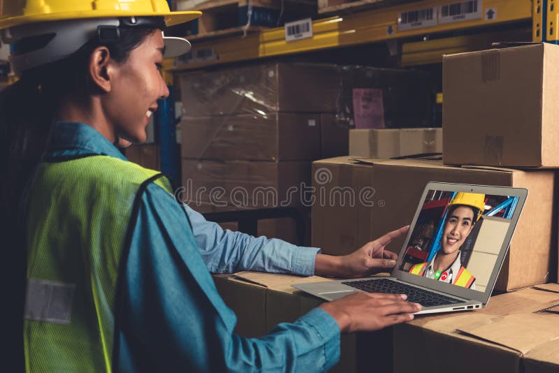 Warehouse Staff Talking on Video Call at Computer Screen in Storage ...