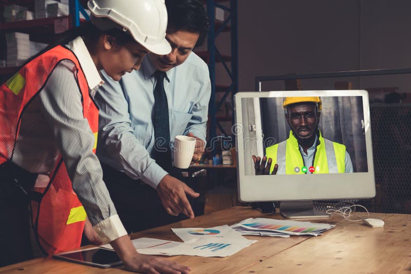 Warehouse Staff Talking on Video Call at Computer Screen in Storage ...
