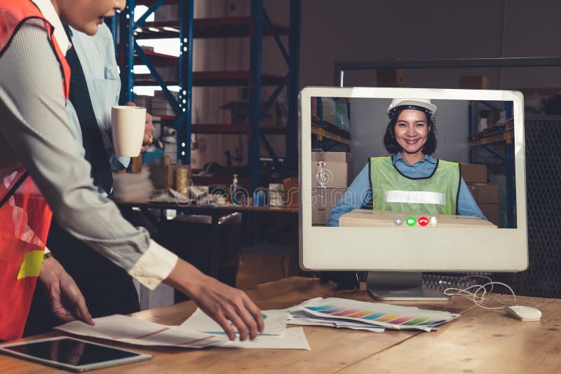 Warehouse Staff Talking on Video Call at Computer Screen in Storage ...