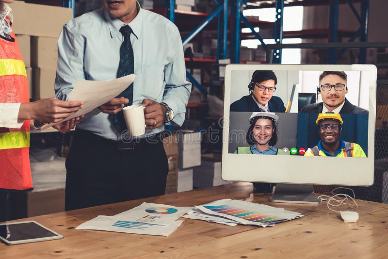 Warehouse Staff Talking on Video Call at Computer Screen in Storage ...