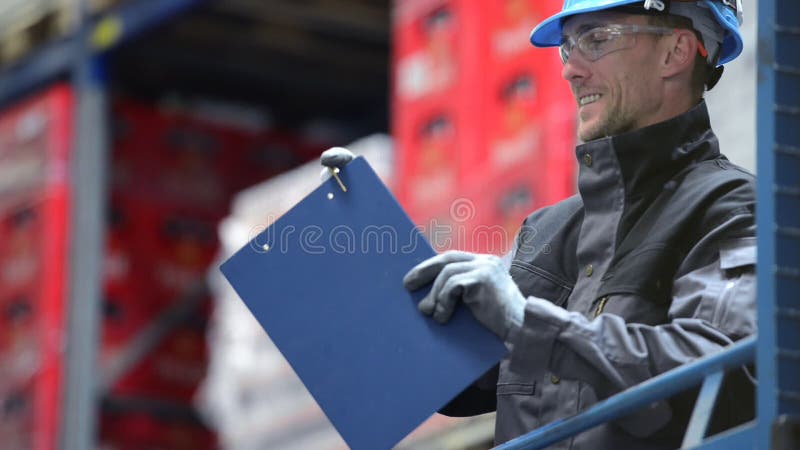 Warehouse Supervisor Checking on the Work Progress Stock Video - Video ...