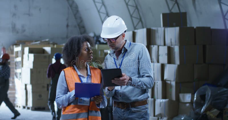 Warehouse Supervisor Overseeing Staff Stock Footage - Video of ...