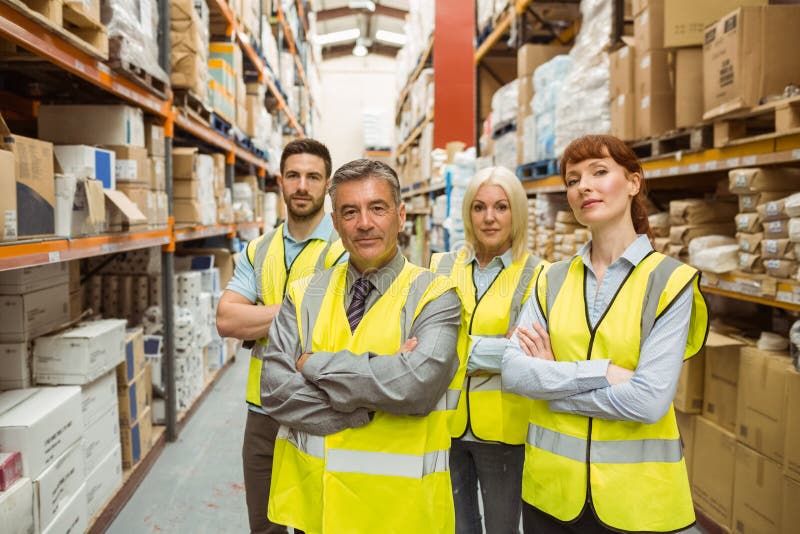 Warehouse Team with Arms Crossed Stock Photo - Image of cheerful ...