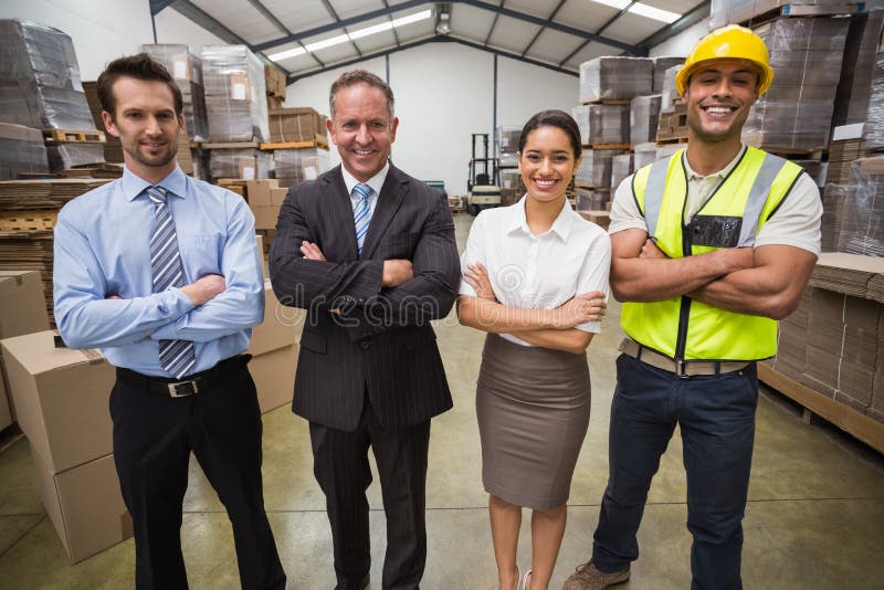 Warehouse Team Having a Meeting Stock Photo - Image of mature, helmet ...