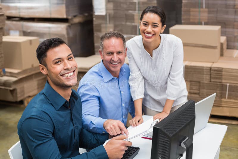 Warehouse Team Having a Meeting Stock Photo - Image of mature, helmet ...