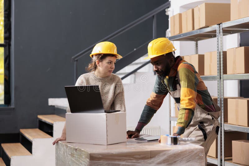 Warehouse Team Using Boxes To Pack Customers Orders Stock Photo - Image ...