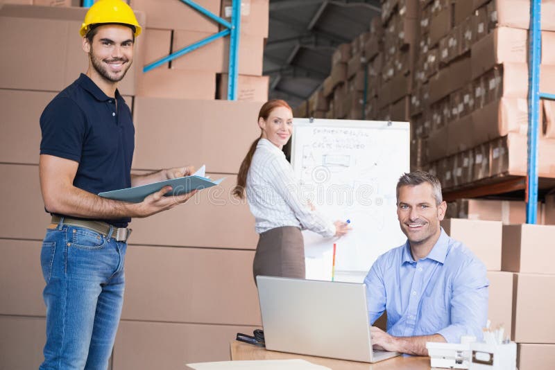 Warehouse Team Working Together on Shipment Stock Image - Image of male ...