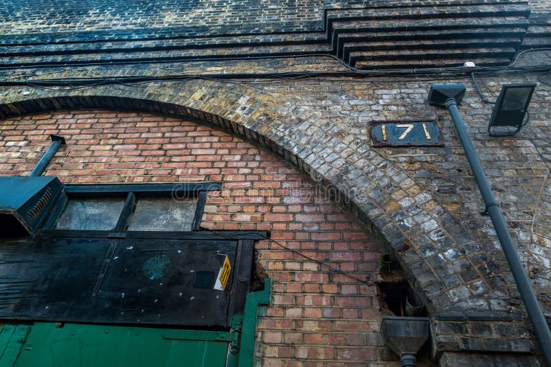Warehouse under the bridge stock photo. Image of room - 144349138