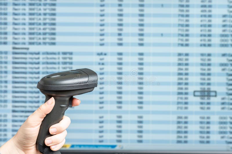 A Warehouse Woman Employee Accepts Cargo, Goods Using Barcode Scanner ...