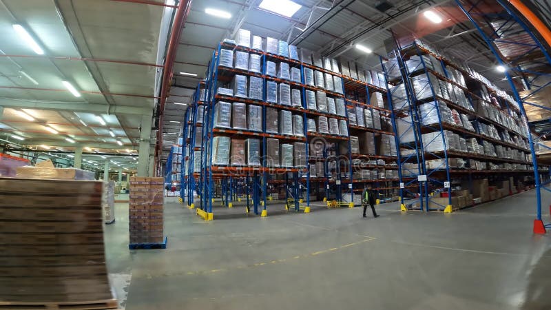 Warehouse Work. Workflow in a Large Warehouse. Special Equipment in the ...