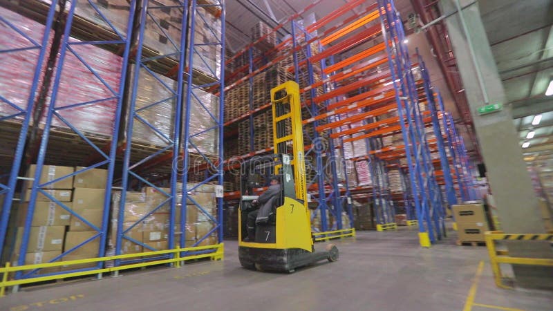 Warehouse Work. Workflow in a Large Warehouse. Special Equipment in the ...