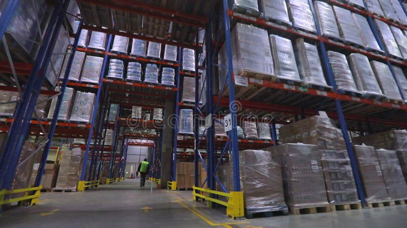 Warehouse Work. Workflow in a Large Warehouse. Special Equipment in the ...