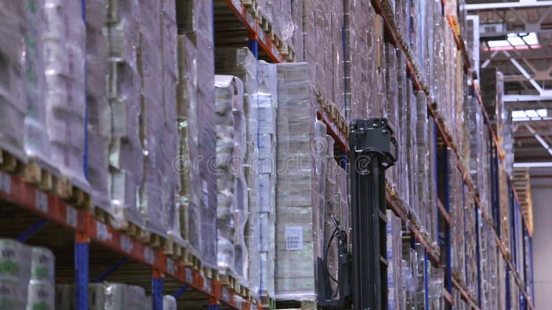 Warehouse Work. Workflow in a Large Warehouse. Special Equipment in the ...