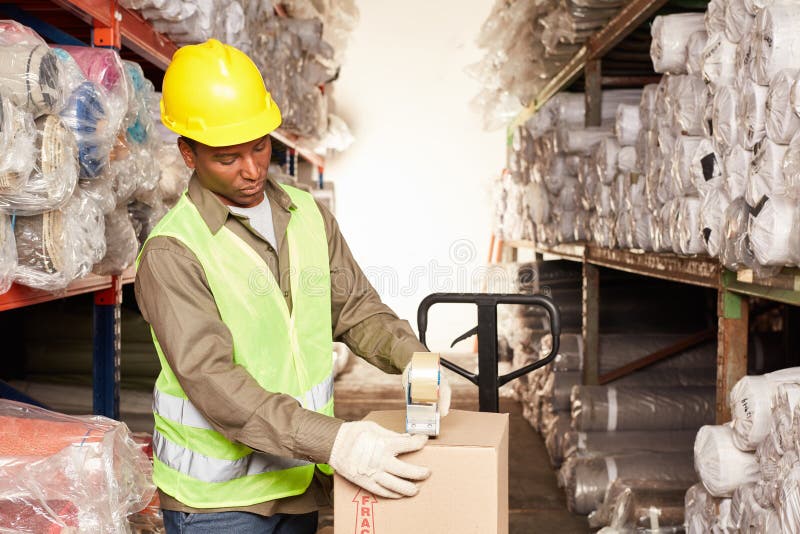 Packer in the Shipping Prepares a Package Stock Photo - Image of ...