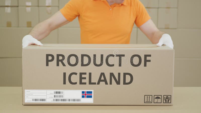 Warehouse Worker and Big Box with PRODUCT of ICELAND Printed Text Stock ...